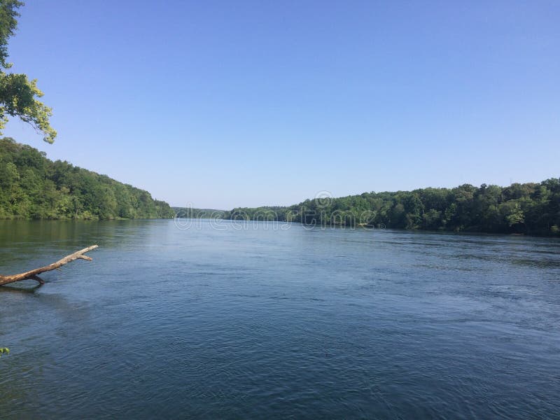 Sun Dappled Cold River stock image. Image of wetland - 182886791