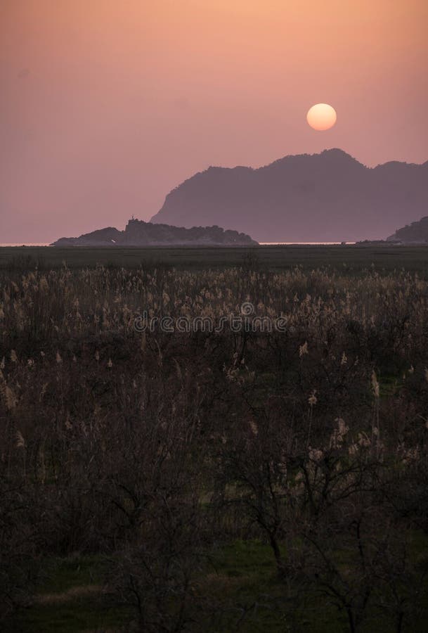 Clear Sky Sunset Over the Mountains. Stock Photo - Image of water ...