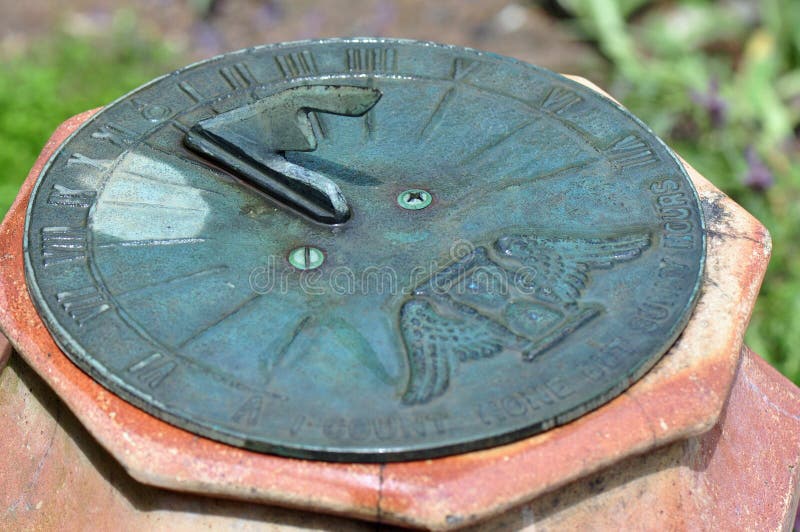 Sun dial solar wall clock stock photo. Image of clock - 36315056