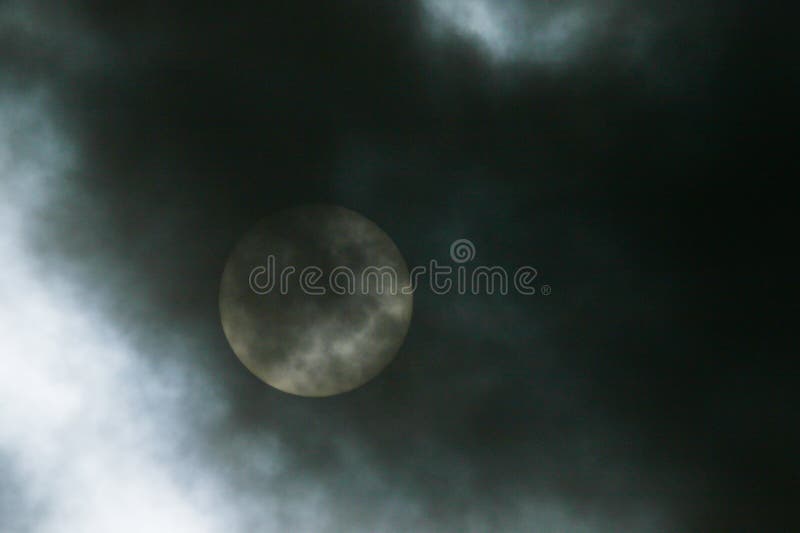 Sun Disk Behind Backlit Clouds Stock Image - Image of light ...