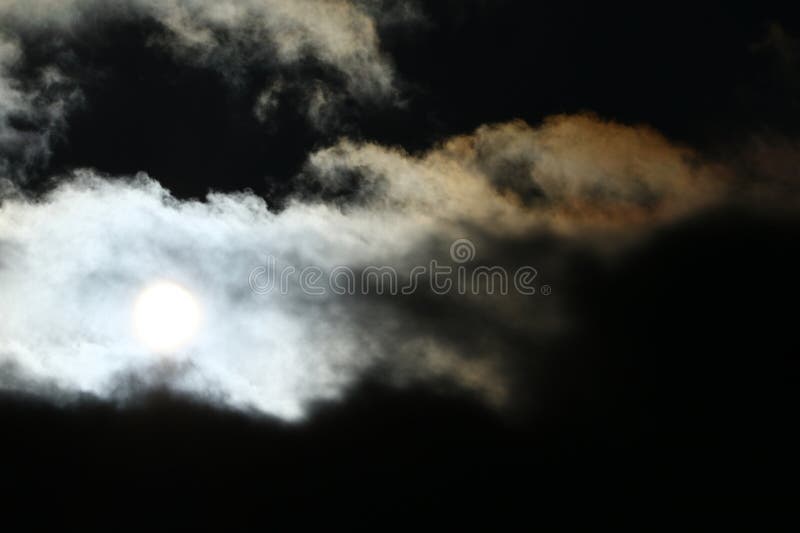 Sun Disk Behind Backlit Clouds Stock Photo - Image of astronomy, nature ...