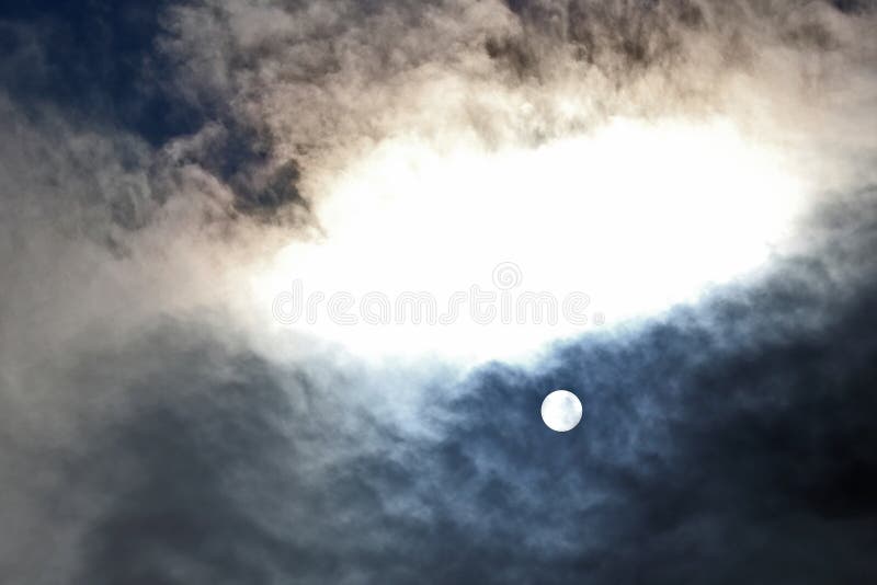 Sun Disk at Noon through the Clouds Stock Image - Image of sunlight ...