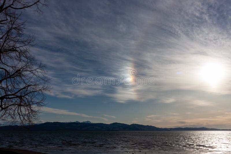 Sun Dog (parhelion) Phenomenon Over Lake Constance Stock Image - Image ...