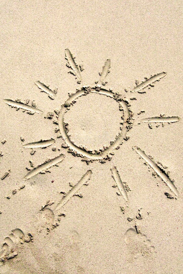 Sun Drawing in the Sand stock photo. Image of holidays - 13779494