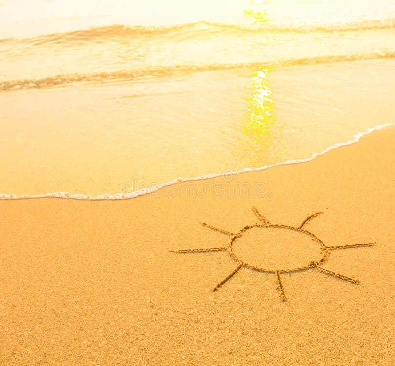 Sun Drawn in the Sand of a Beach, Soft Surf Wave. Travel. Stock Photo ...
