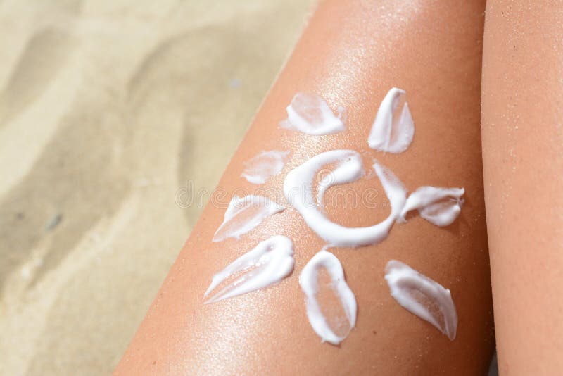 Sun Drawn with Sunscreen on Woman`s Leg at Beach, Closeup Stock Image ...