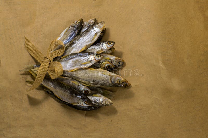 Sun Dried Fish. Fish on the Brown Craft Paper. Bleak. Stock Photo ...