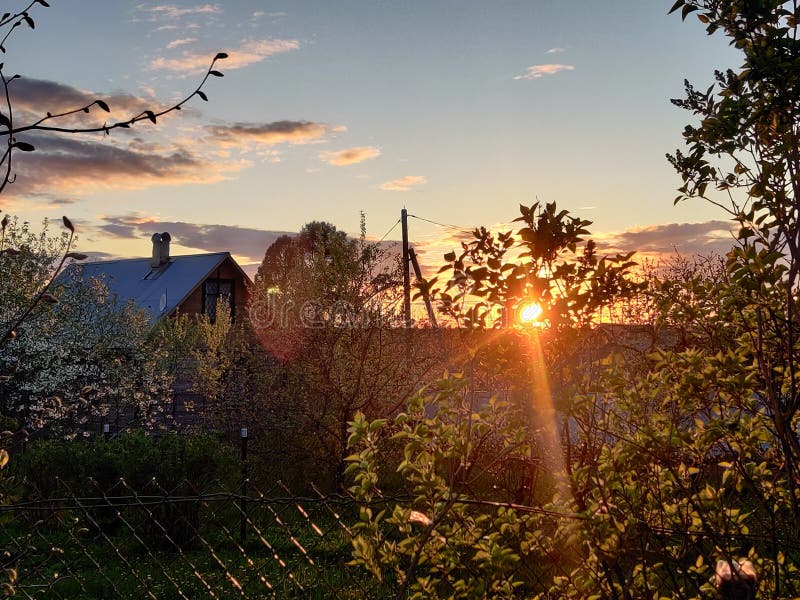 Sun evening Village stock photo. Image of sunset, light - 183779302