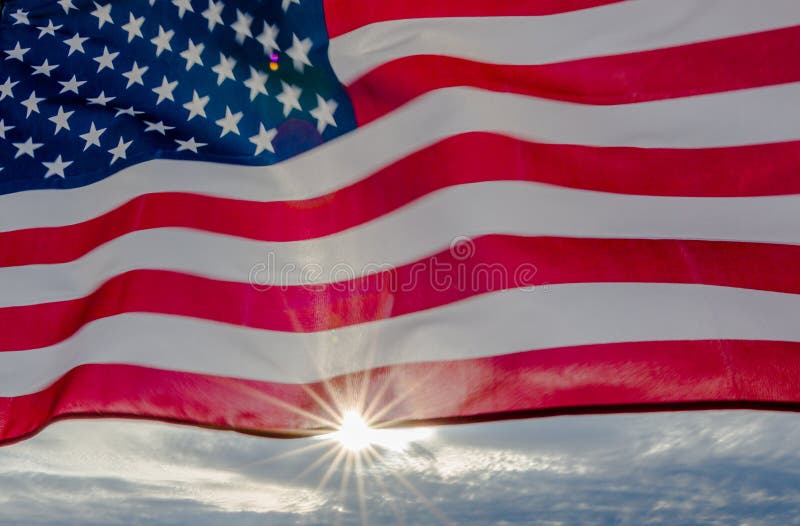 Sun Flare Behind American Flag Stock Photo - Image of patriot, fourth ...