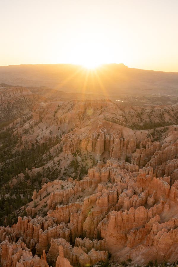 Sun Flares Over the Bryce Amphitheater Stock Image - Image of erosion ...