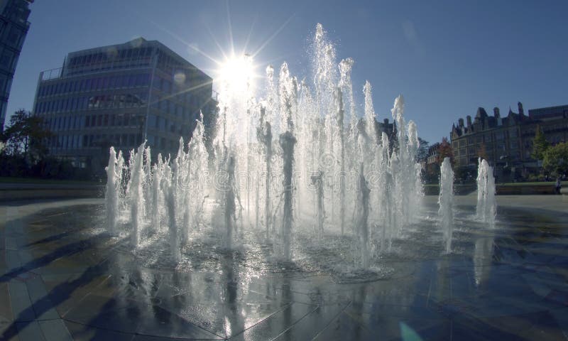 Sun through fountain stock image. Image of england, city - 1501043
