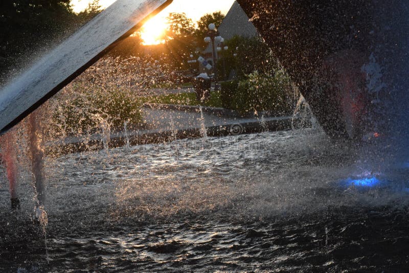 Sun through Fountain stock photo. Image of water, lights - 75586716