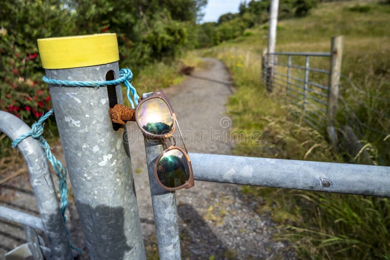 Sun Glasses Resting on a Gate in Rural Ireland Stock Photo - Image of ...