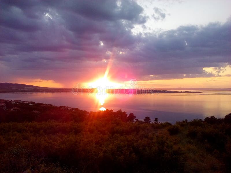 Sunset stock image. Image of hils, water, hills, sunset - 177362881