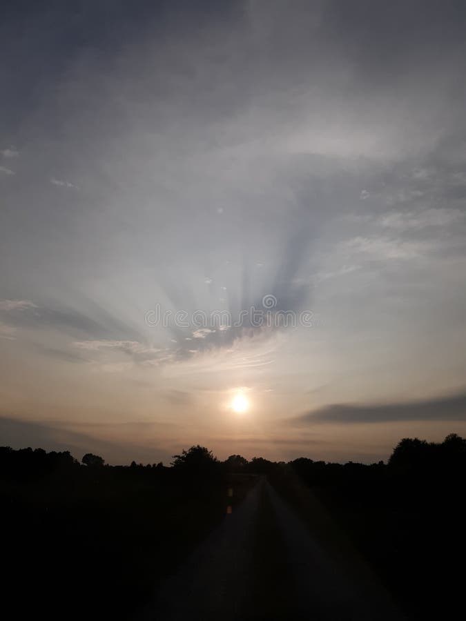 Driving into the sunset stock image. Image of sunset - 78465435