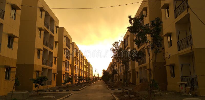 Sun is Going Down Over Modern Buildings at a Construction Site. Stock ...