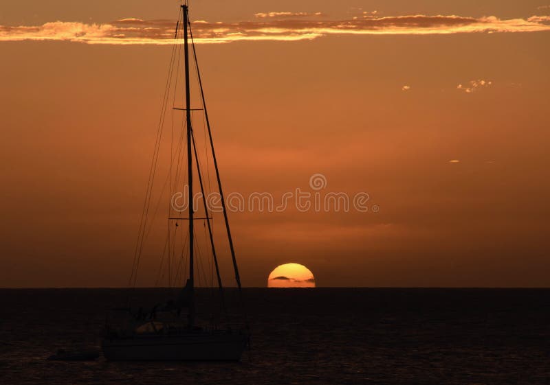 Sun Going Over Horizon at Cape Verde with Boat Stock Photo - Image of ...