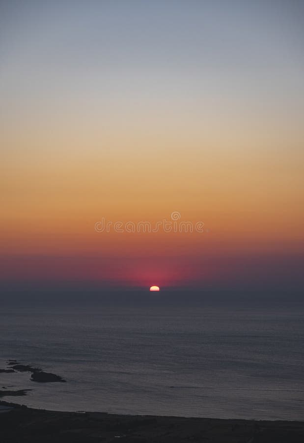 The Sun during Golden Sunset Just Above the Surface of the Sea Stock ...