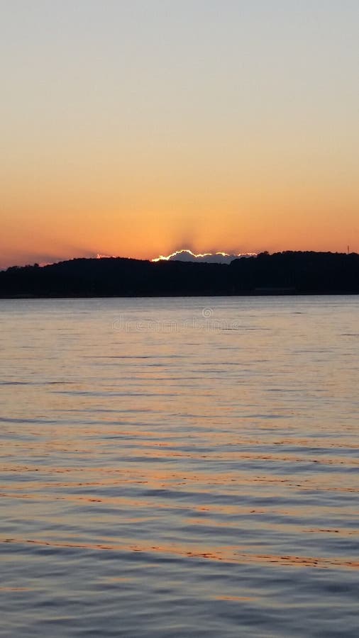 Sun almost Gone for the Day Stock Image - Image of orange, sunset: 79575639