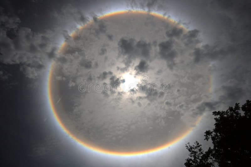 Sun halo stock photo. Image of global, blaze, light, clouds - 5473474