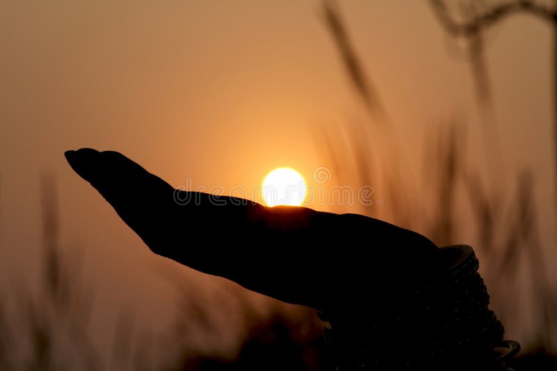 Sun on hand stock image. Image of hand, evening, beauty - 27804931