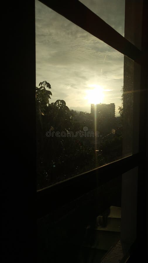 The Sun Has Been Seen Rising from Inside the Building Stock Photo ...