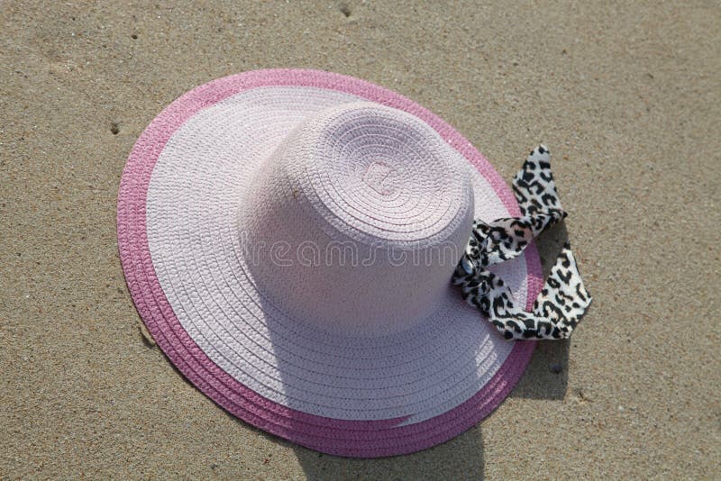 Sun hat at the beach. stock image. Image of seaside, head - 32560273