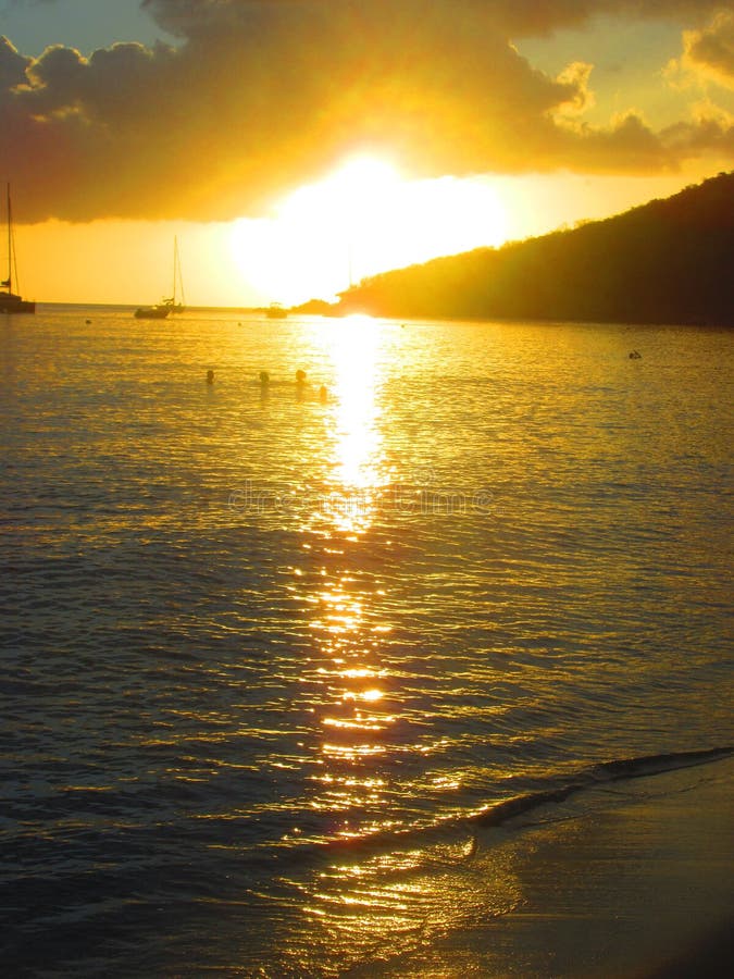 The Sun is Setting Reflecting Off the Sea Stock Photo - Image of nice ...