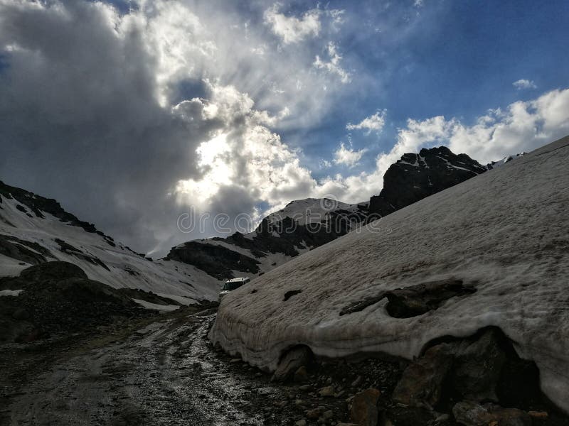 Sun hide and seek stock image. Image of mountains, snow - 155967265