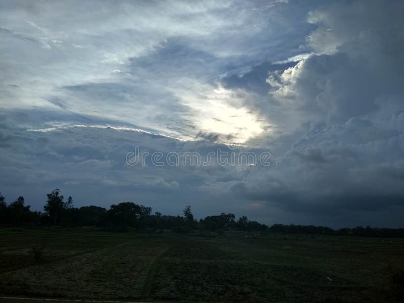 Sun Hiding in the Clouds stock photo. Image of awesome - 152600066