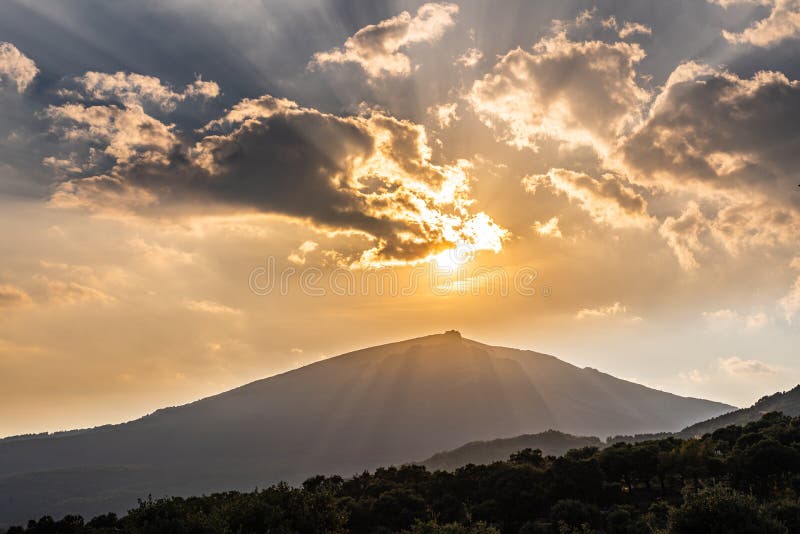 Sun hiding on a mountain stock photo. Image of scenic - 159820036