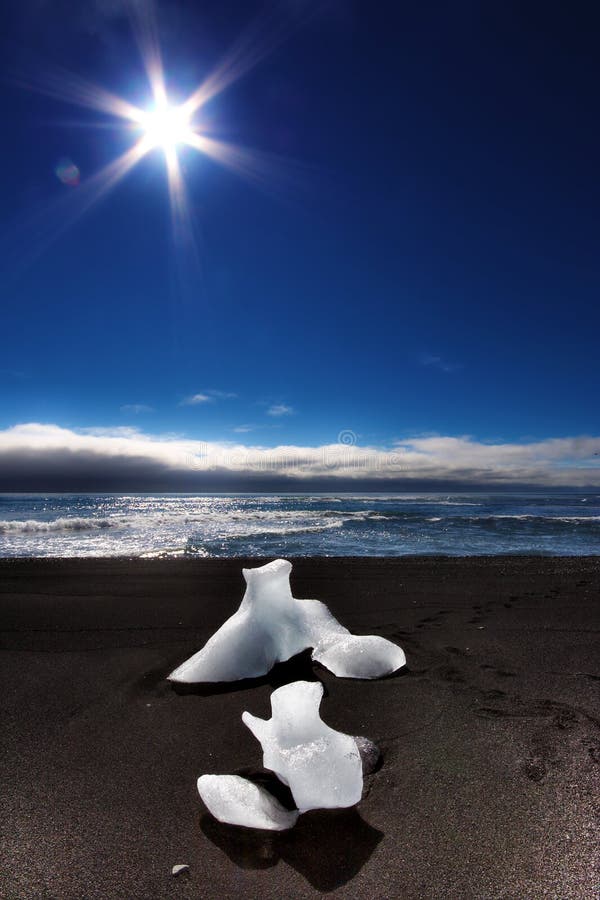 Ice on the sand stock photo. Image of light, sunlight - 34810934