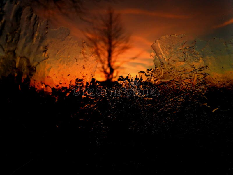 Sun with Ice stock photo. Image of cloud, night, reflection - 183658574