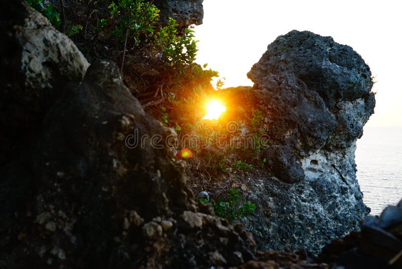 Sun Inside Rock by the Sea. Stock Photo - Image of natural, formation ...