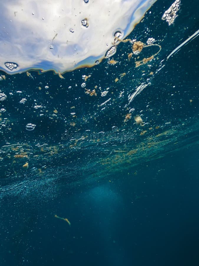 Sun Light Beams Shining from Above Coming through the Ocean Deep Blue ...