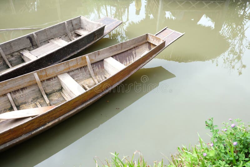 Old small boats in a lake stock image. Image of asia - 189478583