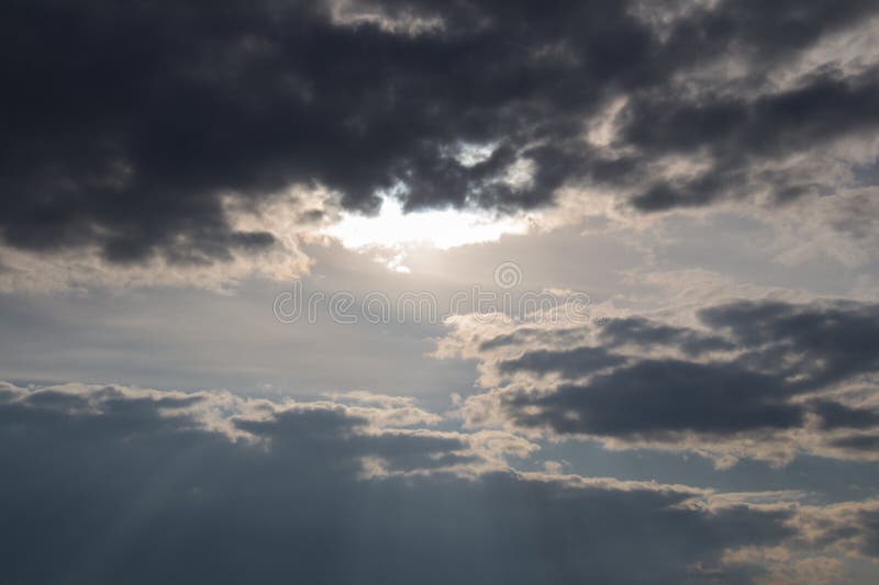 Sun Lights Coming through Clouds. Skyscape at Sunset Stock Photo ...