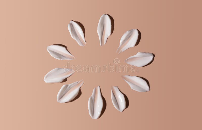 Sun Made of Cream Texture Cosmetic Brush on Beige Background. Sunscreen ...