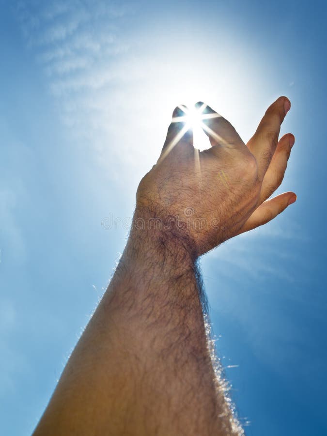 Sun in the mans hand. stock image. Image of hold, mans - 168082687