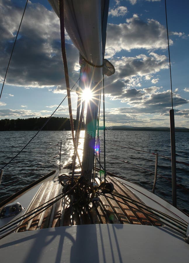 The Sun on the Mast of the Boat. Stock Photo - Image of water, sail ...