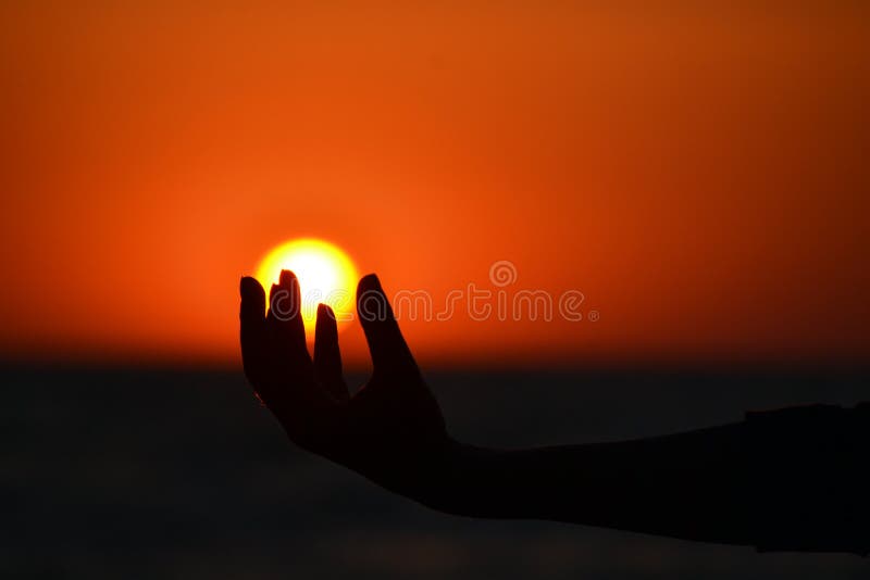 Sun on my hand stock photo. Image of beach, female, sunrise - 73906906