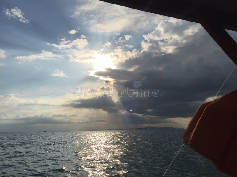 Sun on ocean stock photo. Image of clouds, afternoon - 92208076