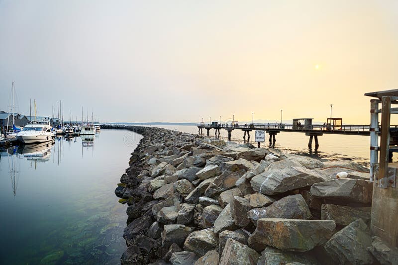 Sun over the Edmonds pier stock image. Image of northwest - 20258455