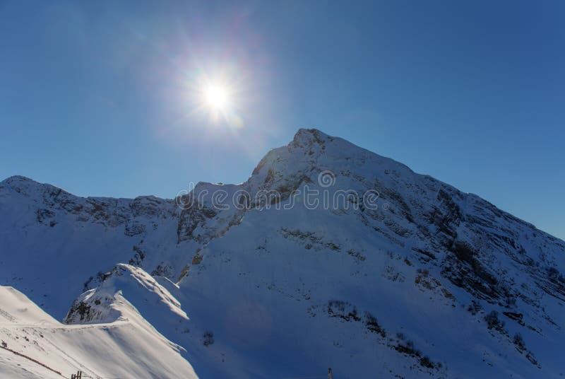 Sun Over the Mountain Peaks Stock Image - Image of blue, cliff: 48276689
