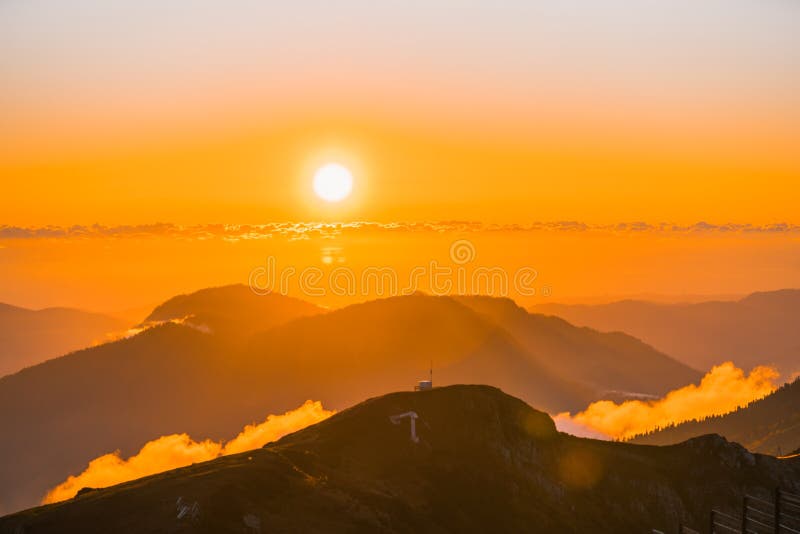 The Sun Over the Mountain Peaks Stock Image - Image of illuminates ...