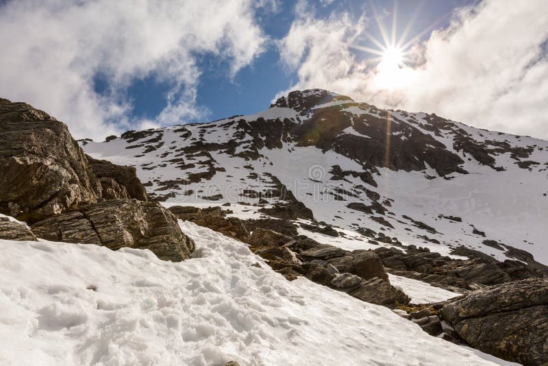 Sun over the mountain stock image. Image of flare, meadow - 62304009