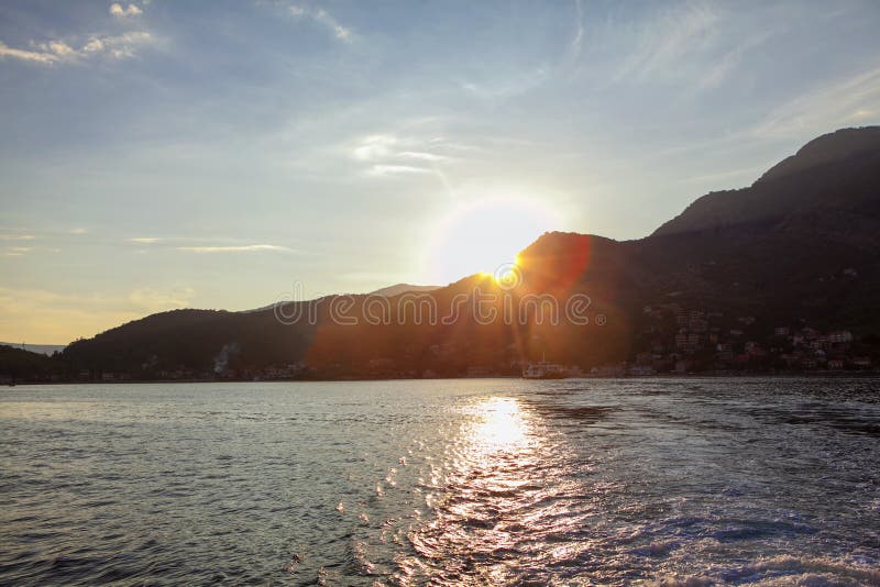 Sun over the mountain stock photo. Image of river, clouds - 144865678