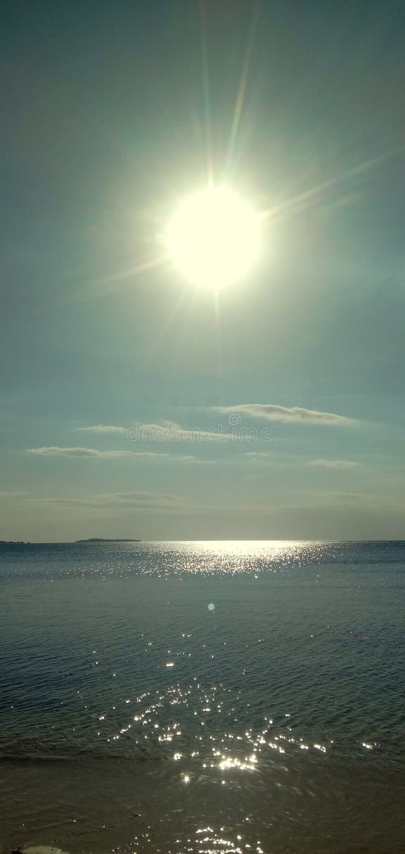 Sun over the ocean stock image. Image of sunset, horizon - 262689239