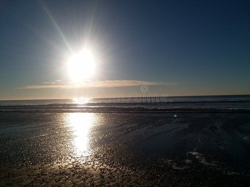 Sun over Pacific Ocean stock photo. Image of brilliantly - 110449356