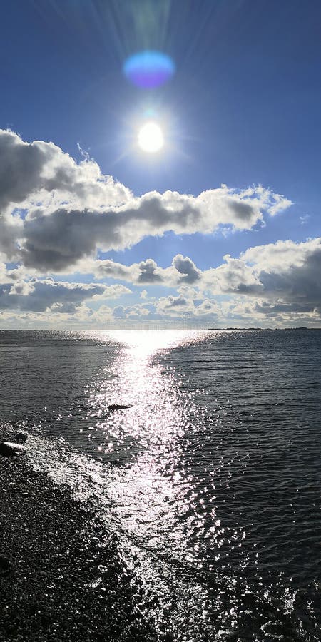 Sun over shiny water. stock image. Image of ocean, shiny - 149400319